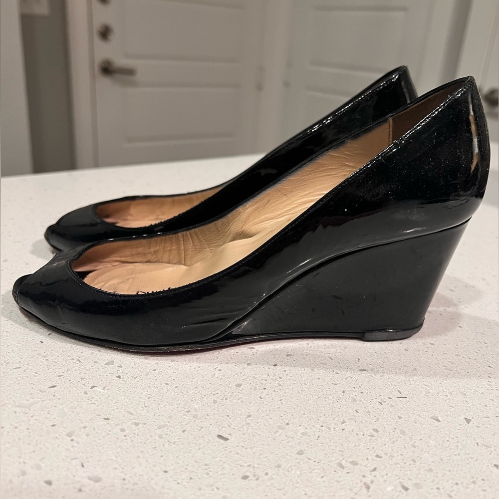 Christian Louboutin Black Patent Leather Wedge Heel. … - Gem
